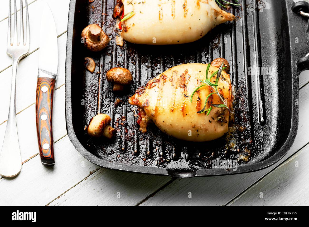 Tasty grilled squid tubes hi-res stock photography and images - Alamy