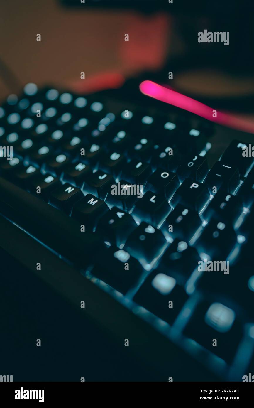 Keyboard in low light Stock Photo - Alamy