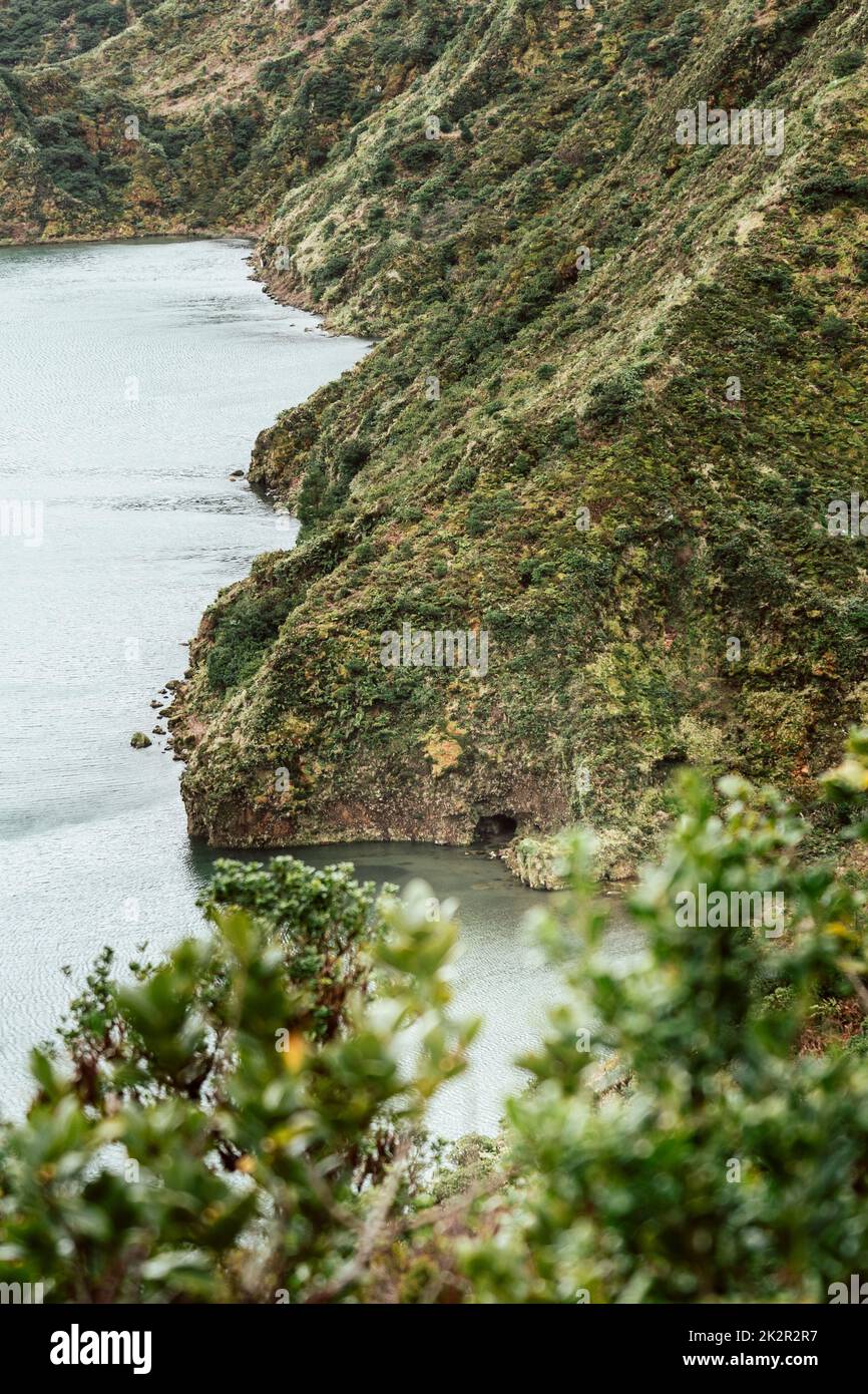 A mountain cliff overlooking the ocean Stock Photo - Alamy