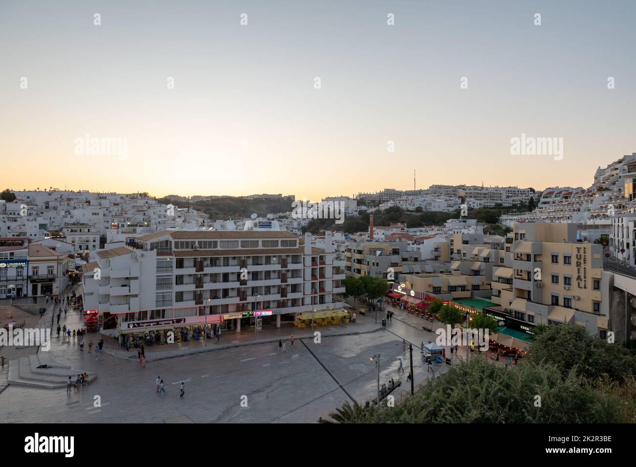 A beautiful sunset over the tourist city of Albufeira in Algarve ...
