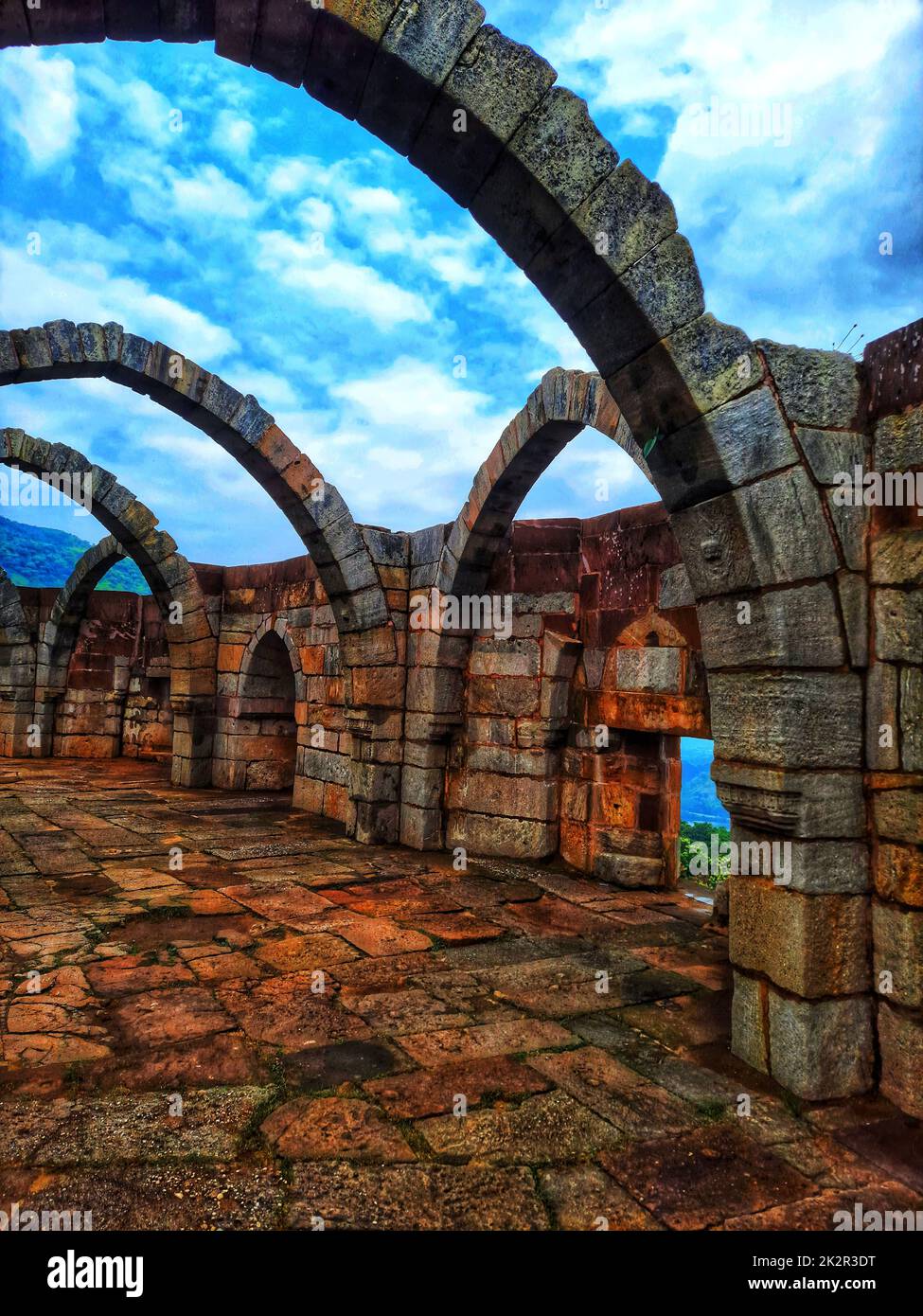 A view of a landmark with arches supposedly in india made of red stone ...