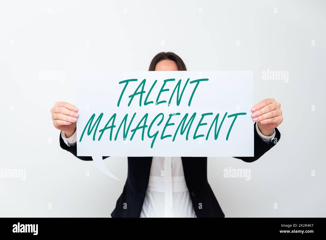 Sign displaying Talent ManagementAcquiring hiring and retaining ...