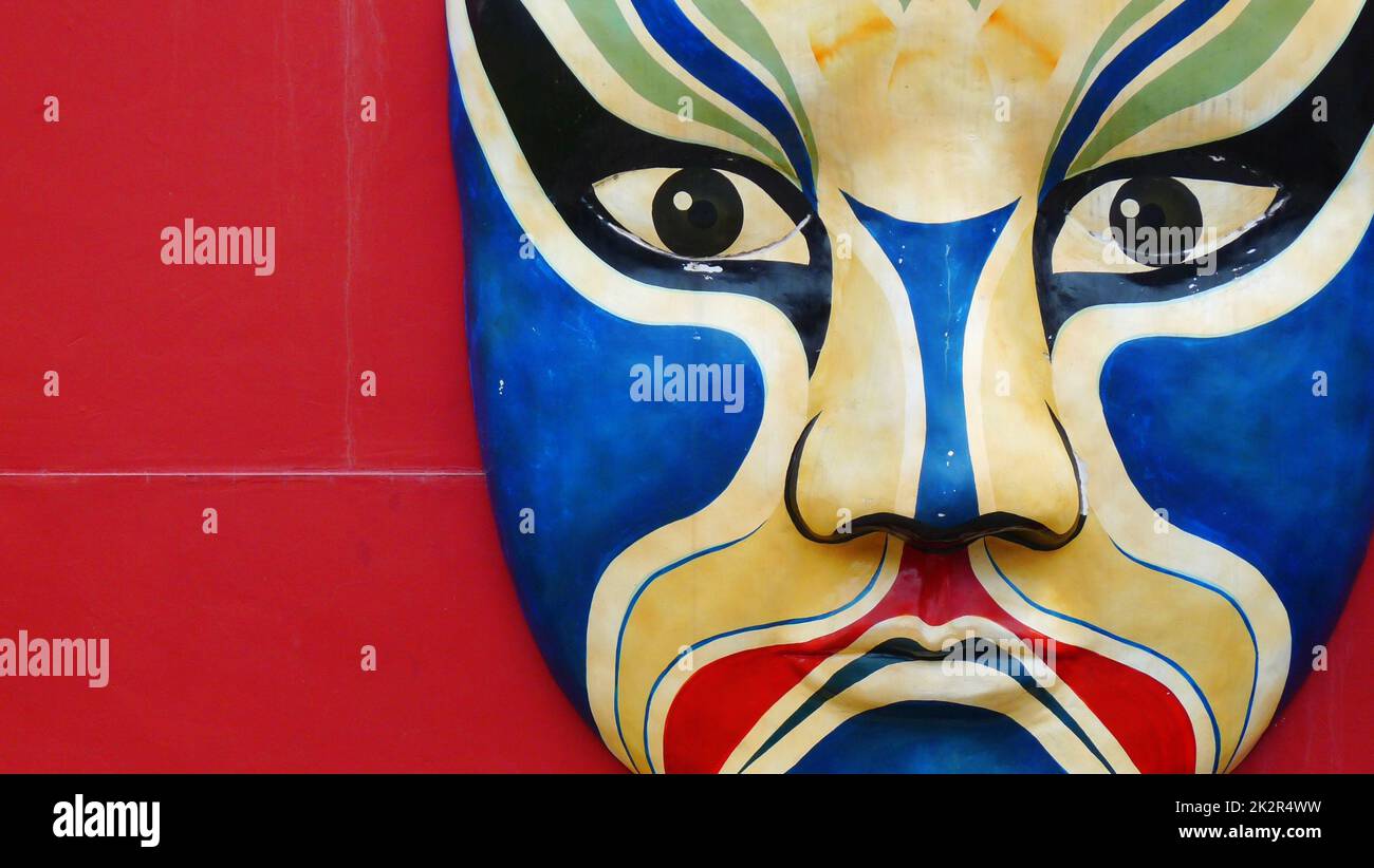 A close up of a bright folk mask Stock Photo - Alamy