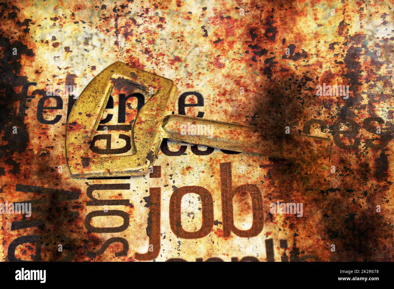 Golden key on job text Stock Photo - Alamy