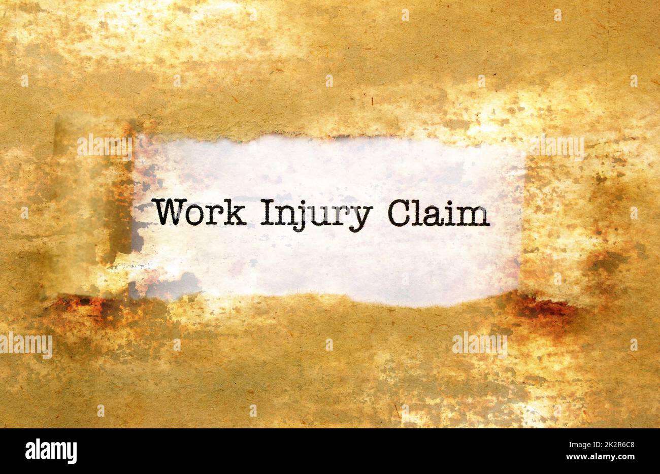 Work injury claim text on grunge background Stock Photo - Alamy