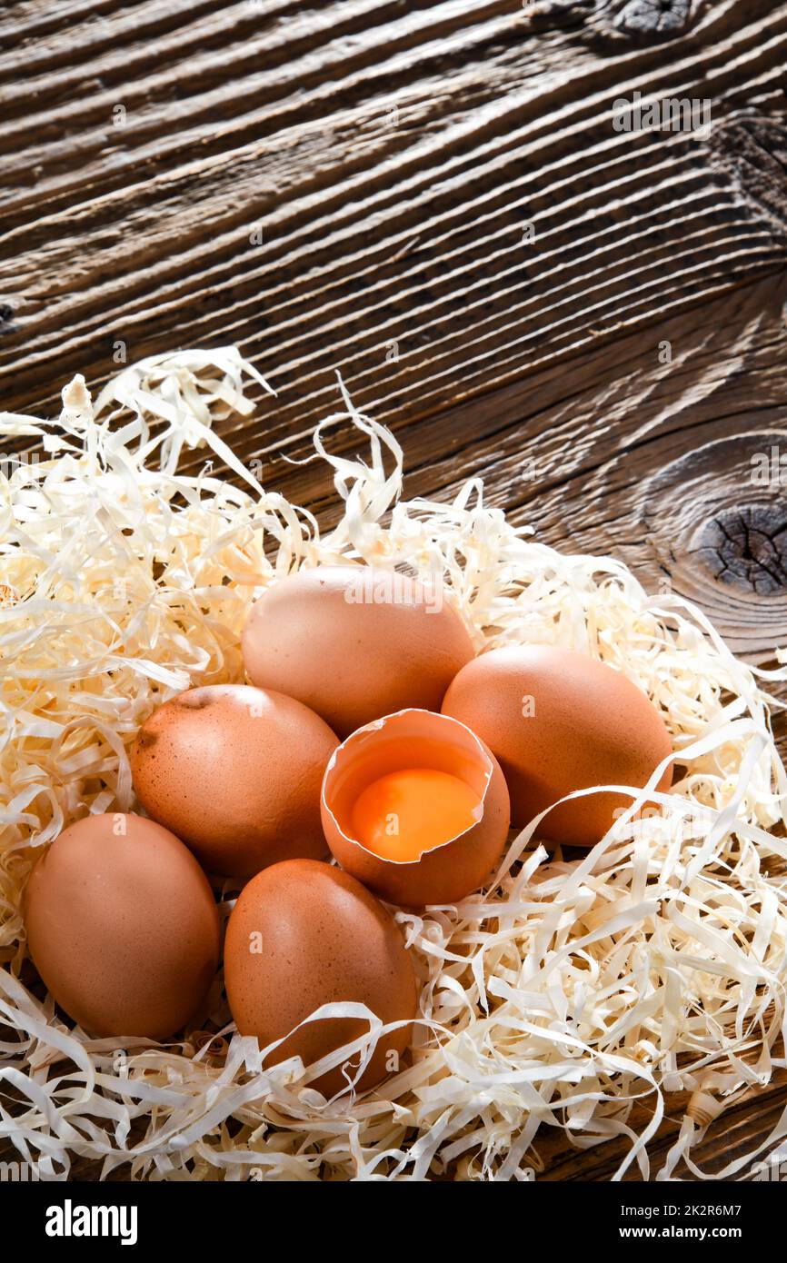Composition with six chicken eggs on wood Stock Photo - Alamy