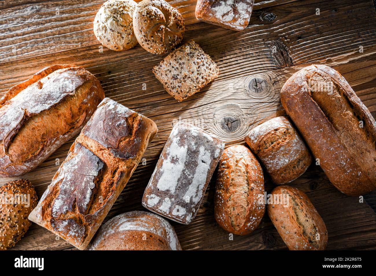 Composition with assorted bakery products on wooden table Stock Photo ...