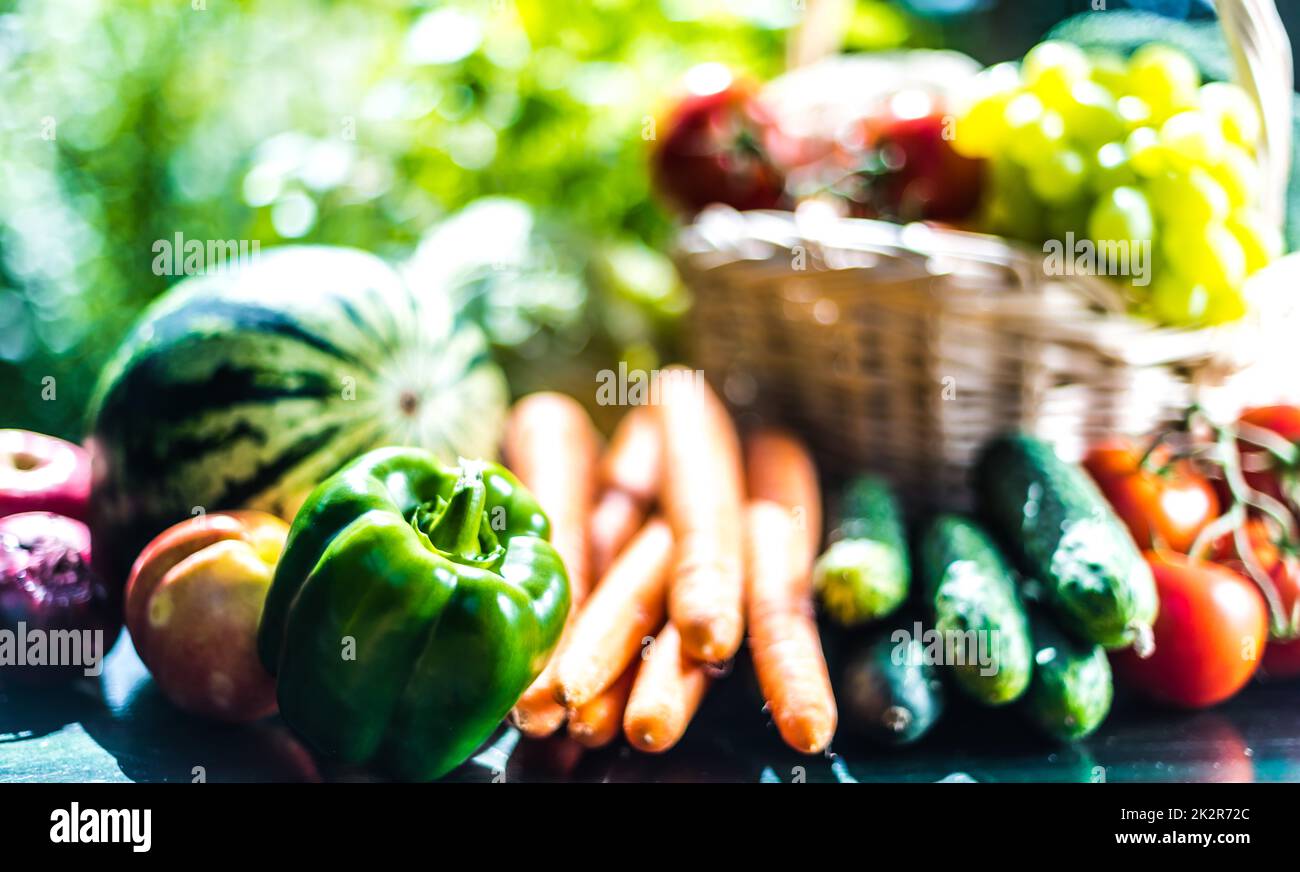 Variety of fresh organic vegetables and fruits in the garden Stock ...