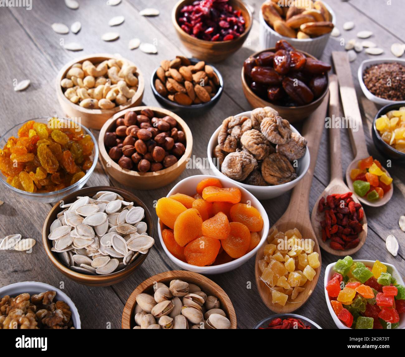 Composition with dried fruits and assorted nuts. Delicacies Stock Photo ...