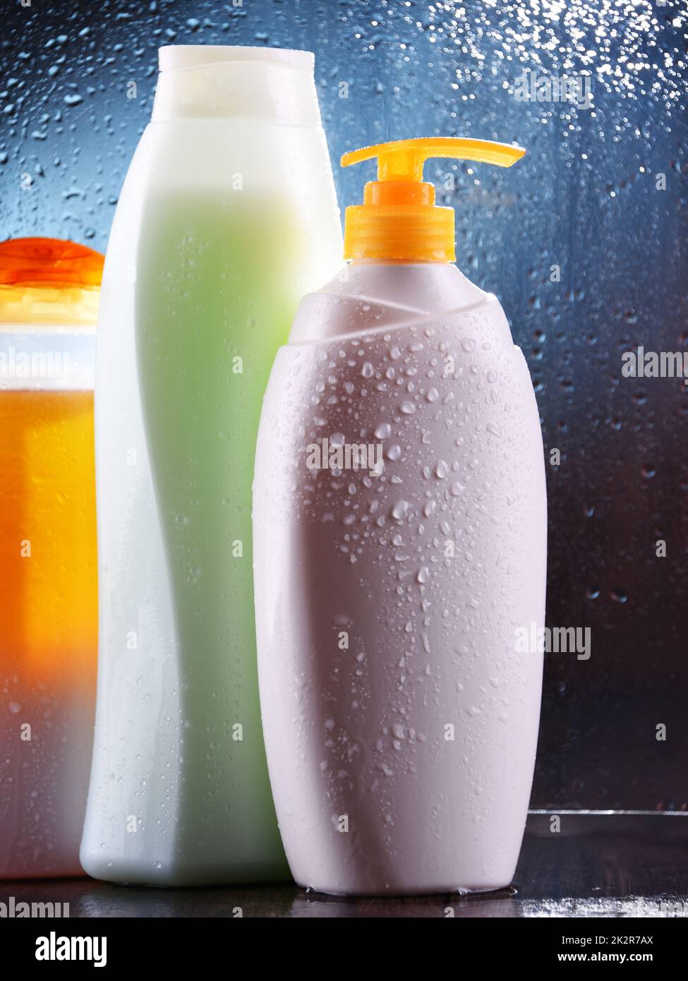 Different containers of body care products in the bathroom Stock Photo ...