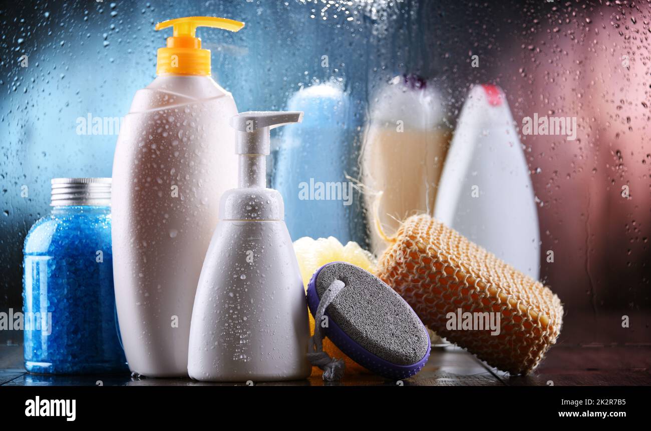 Different containers of body care products in the bathroom Stock Photo ...