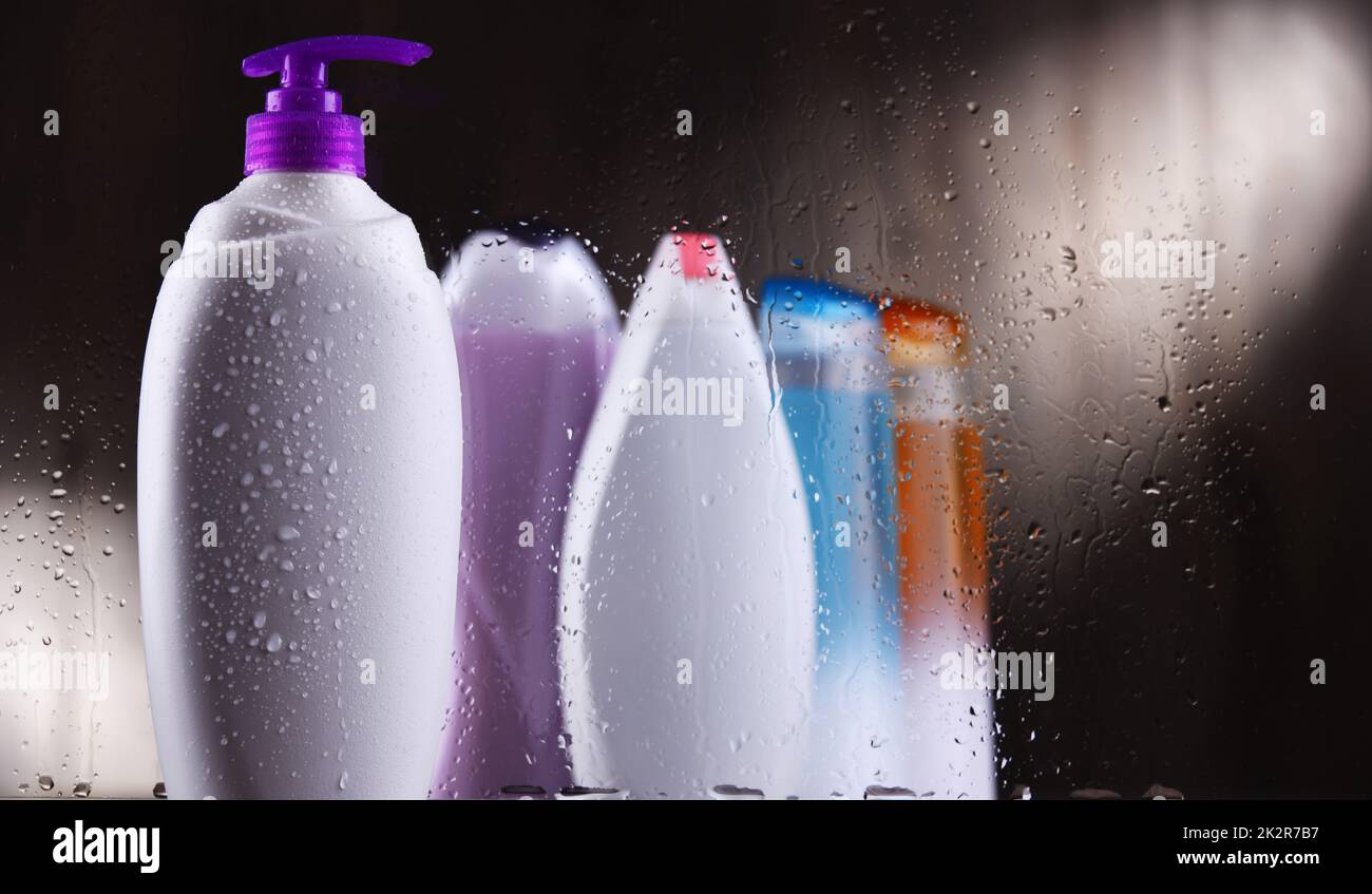 Different containers of body care products in the bathroom Stock Photo ...