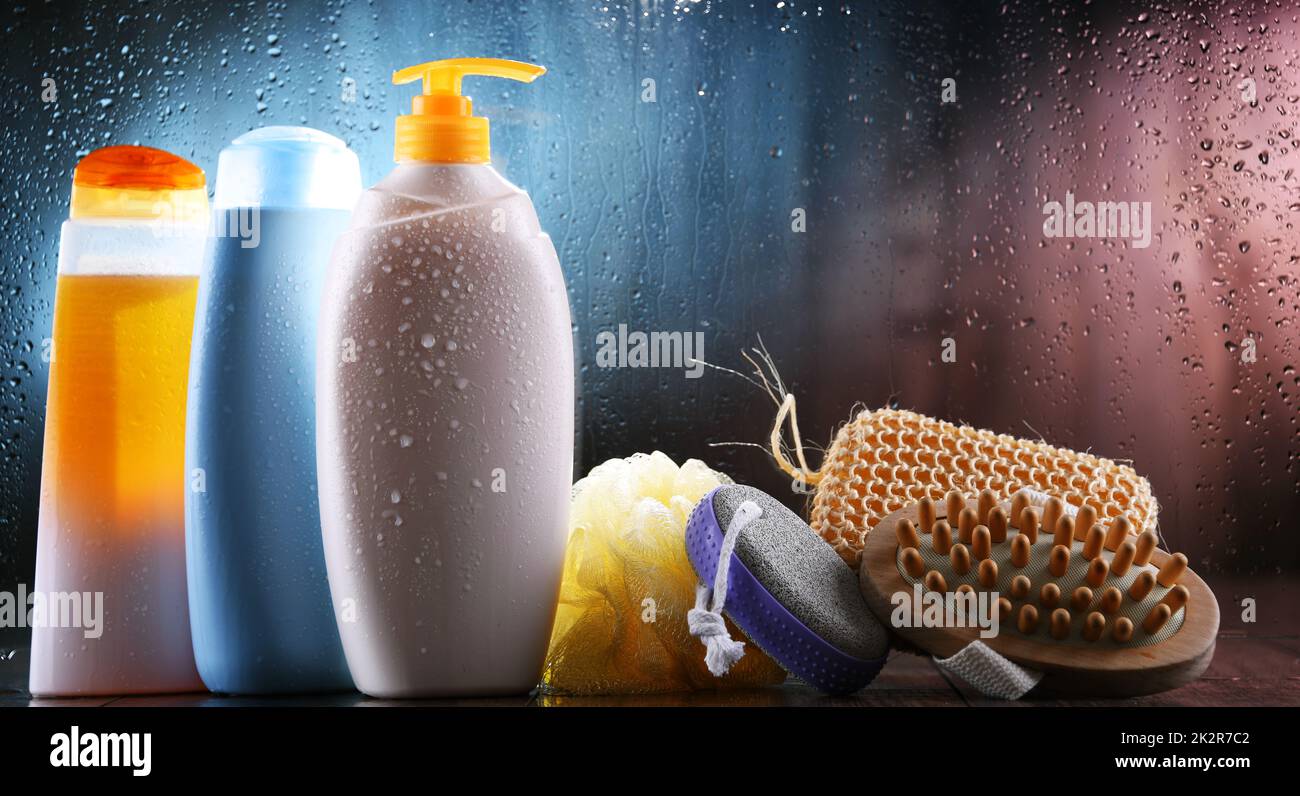 Different containers of body care products in the bathroom Stock Photo ...