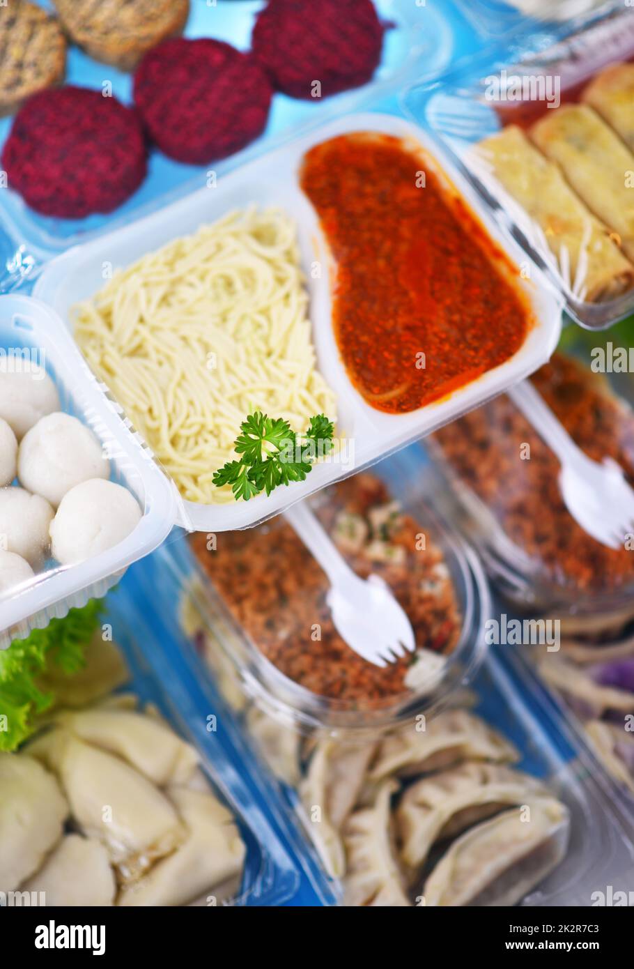 A variety of prepackaged food products in plastic boxes Stock Photo - Alamy