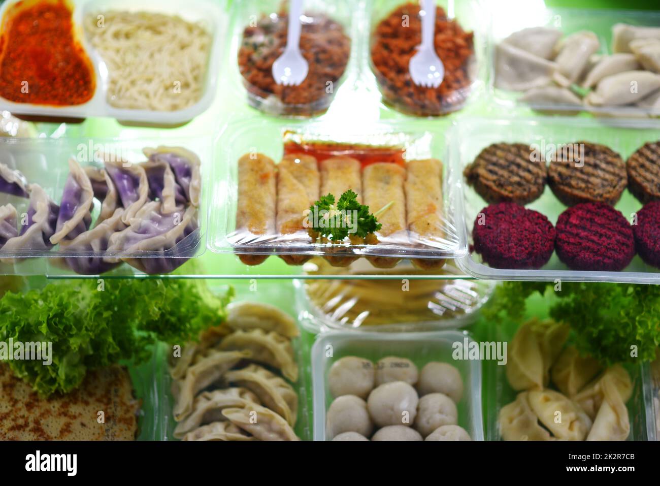 A variety of prepackaged food products in plastic boxes Stock Photo - Alamy