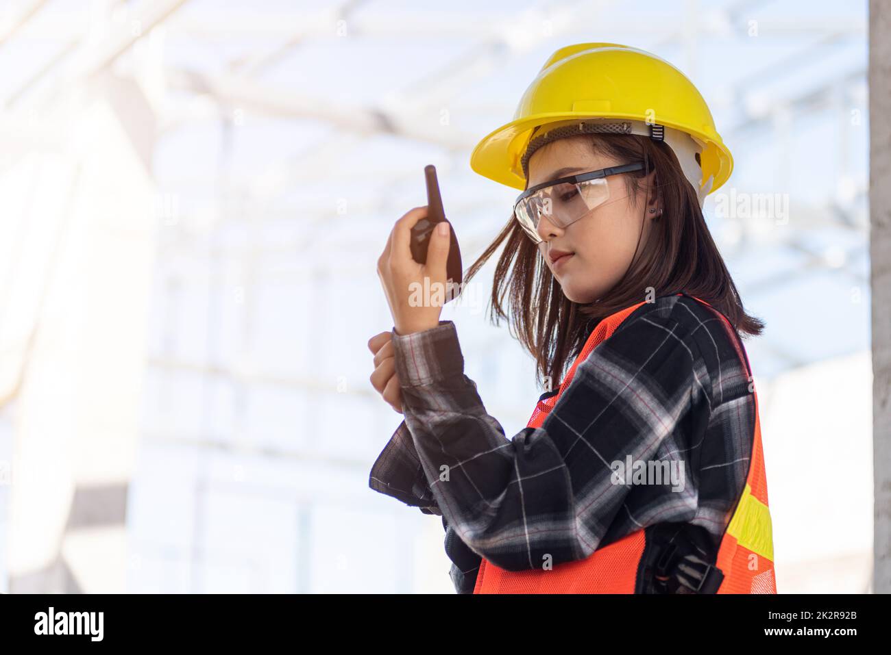 Asian engineer foreman architect worker woman working at building ... Asian engineer foreman architect worker woman working at building ...