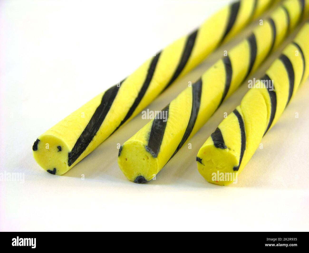 Candy cane, candy in the shape of a small stick made of colored sugar ...