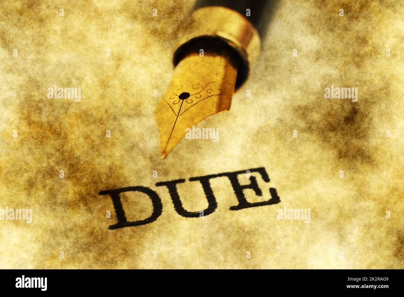 Fountain pen on due text Stock Photo - Alamy
