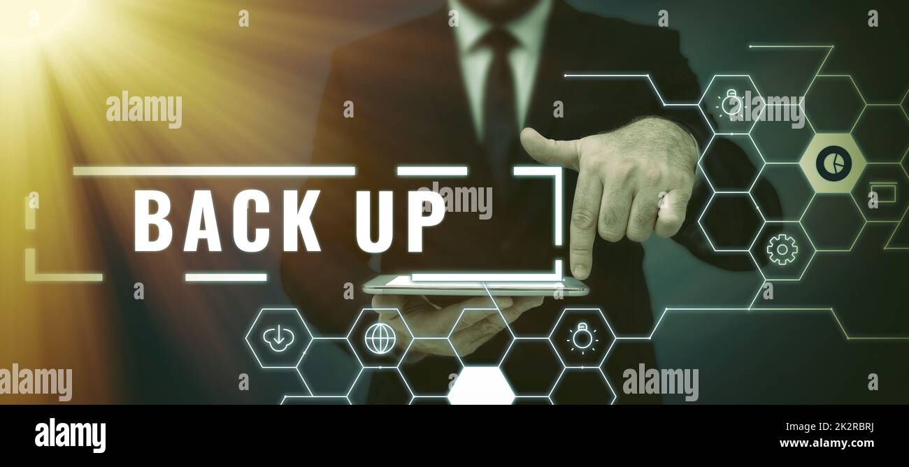 Text sign showing Back Up. Business showcase saving important data into ...