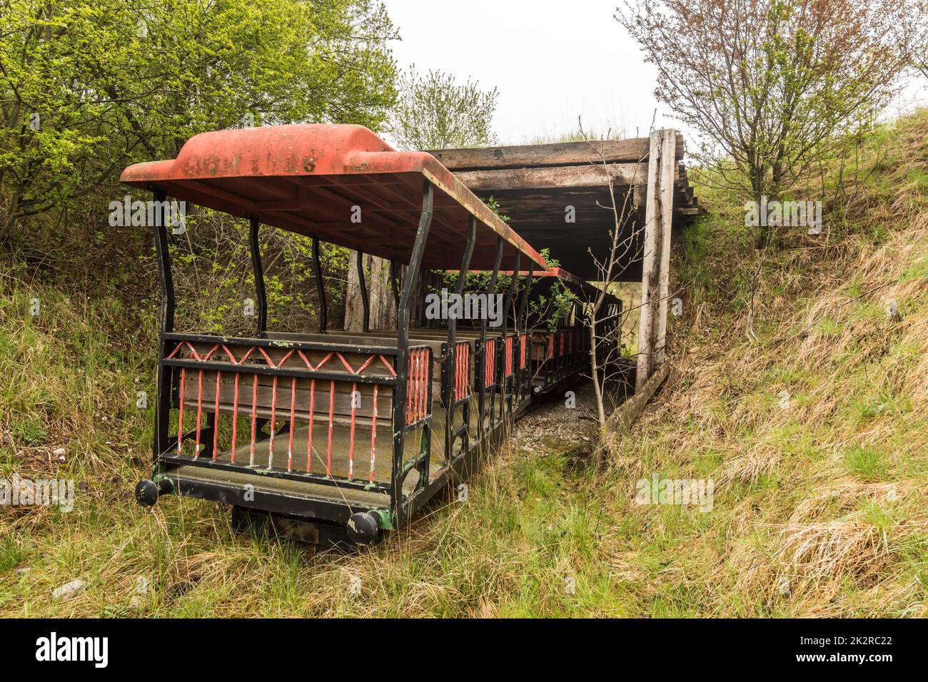 little train under a bridge from a abandoned western town view from ...