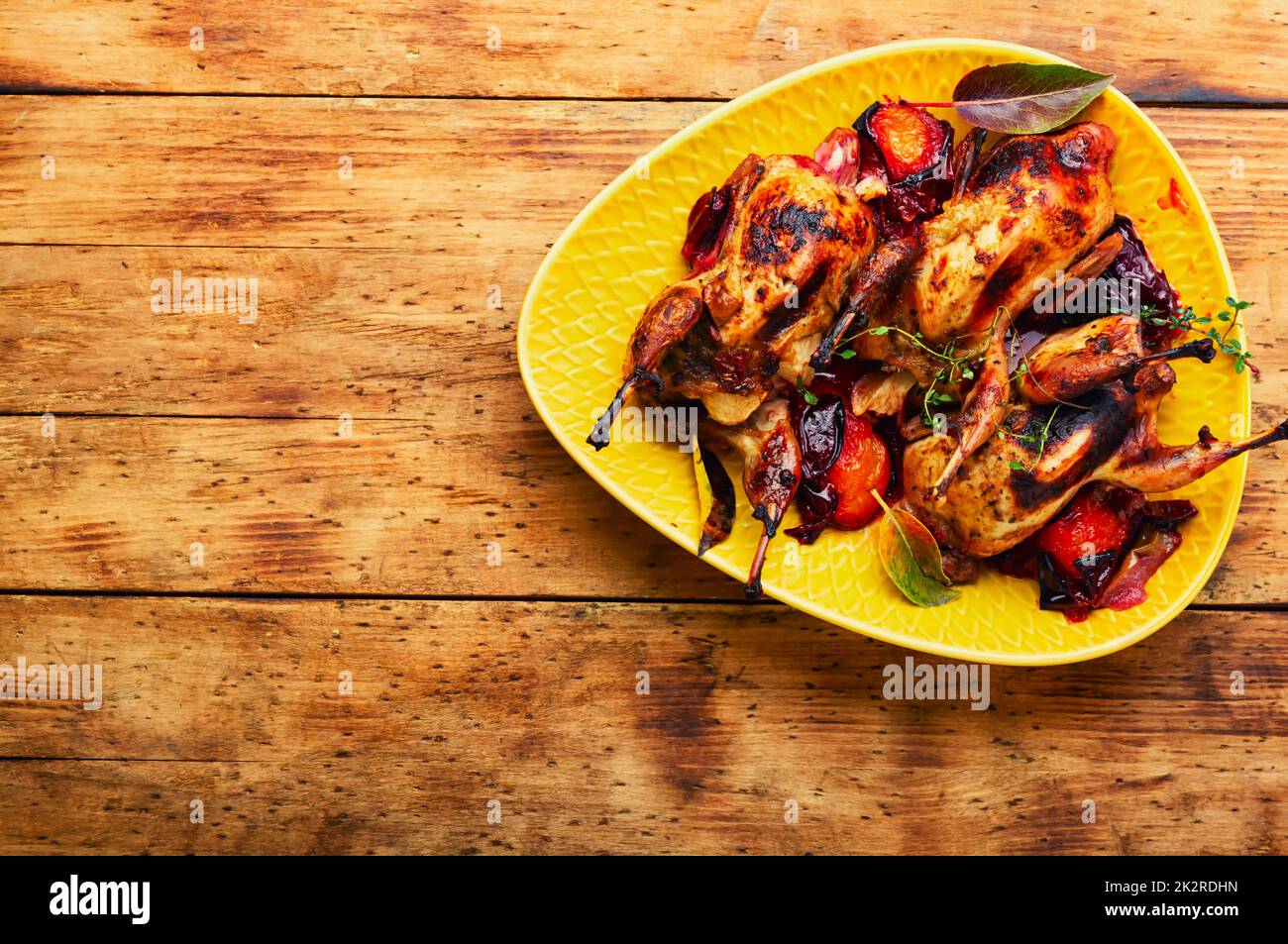 Roasted quails, dietary meat Stock Photo - Alamy