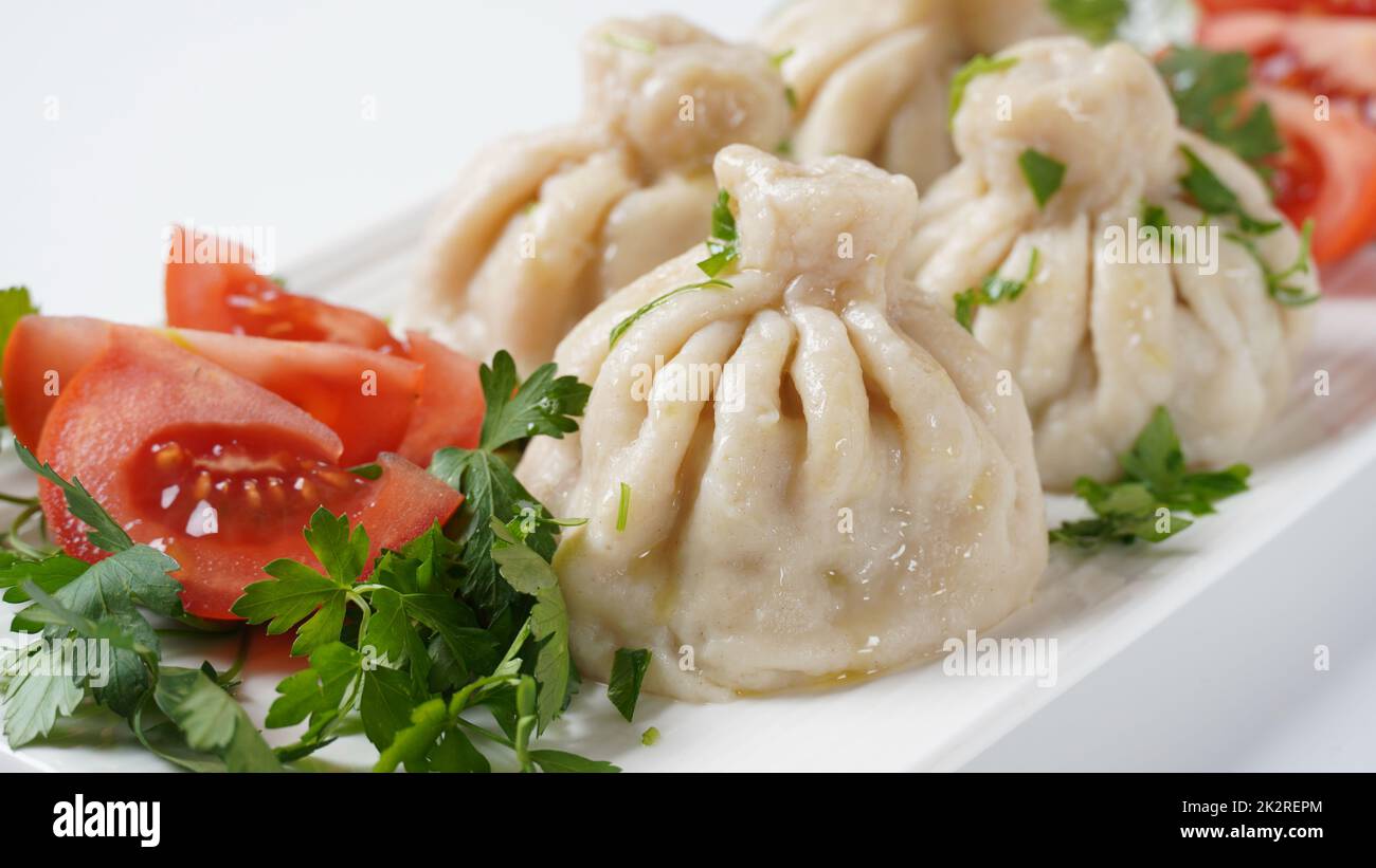 Georgian dumplings Khinkali with meat and red pepper, Traditional ...