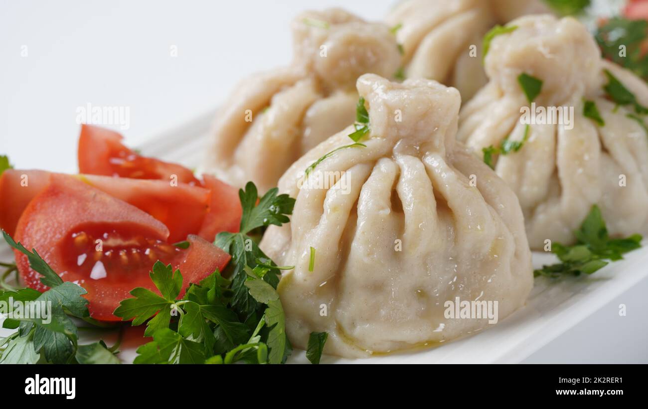 Georgian dumplings Khinkali with meat and red pepper, Traditional ...