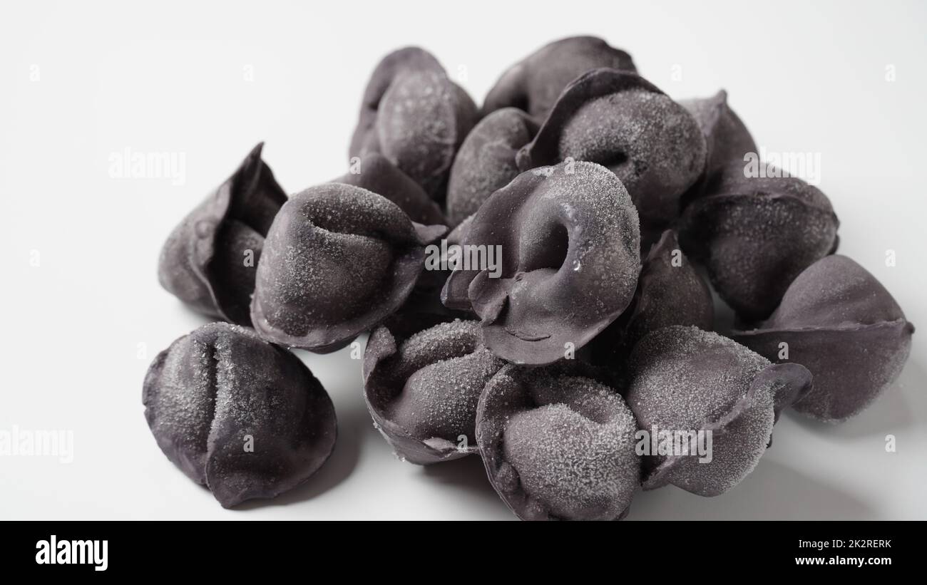 Colorful dumplings stuffed with meat. Colorful dumplings are a ...