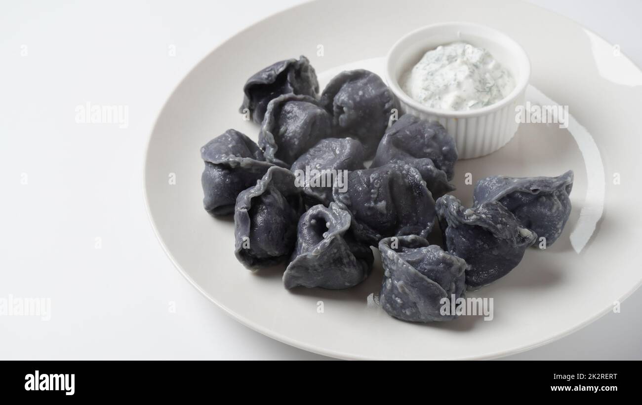 Colorful dumplings stuffed with meat. Colorful dumplings are a ...