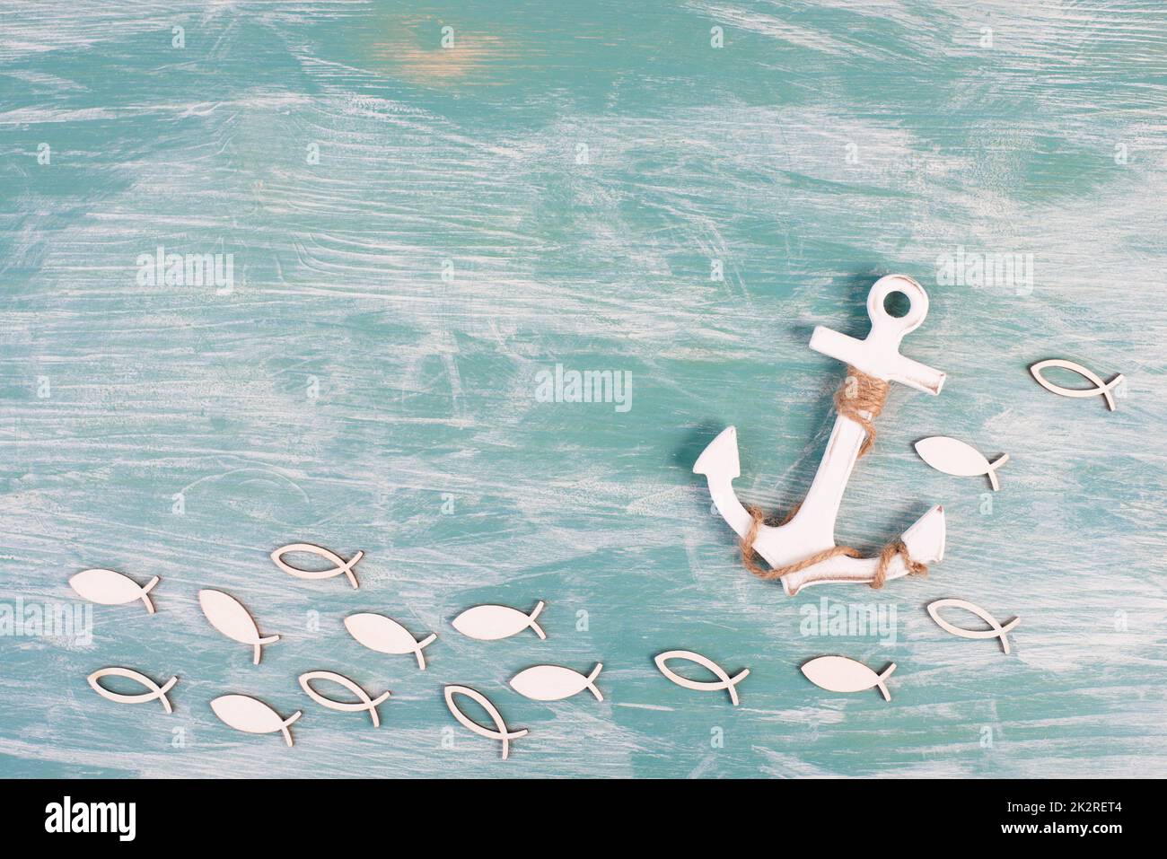 White anchor and fish on a blue background, maritime sea life, sailing ...