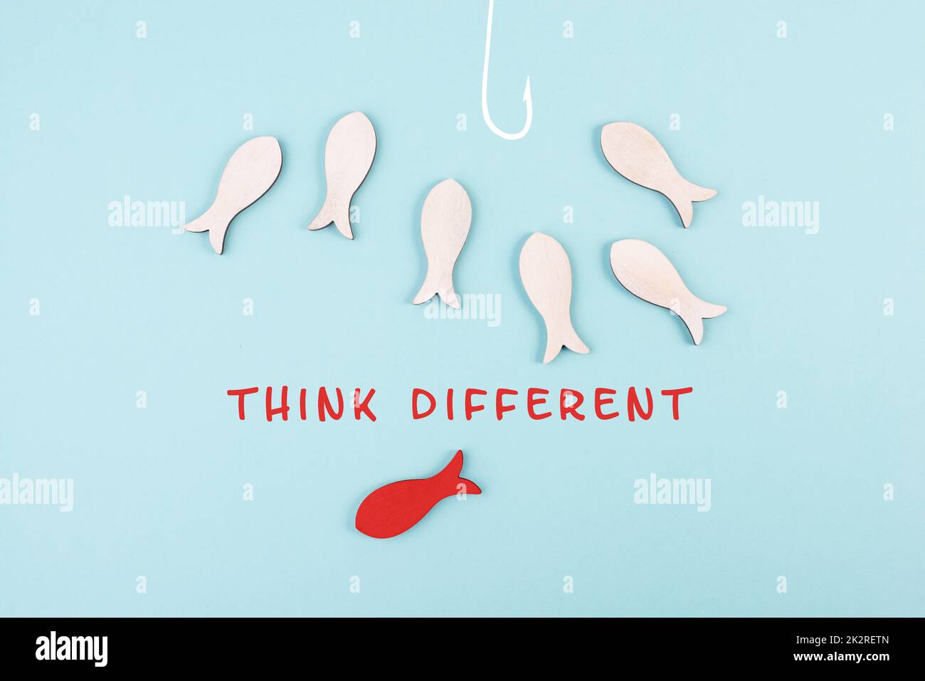 Group of fishes swimming to the fishing rod, red fish thinks different ...