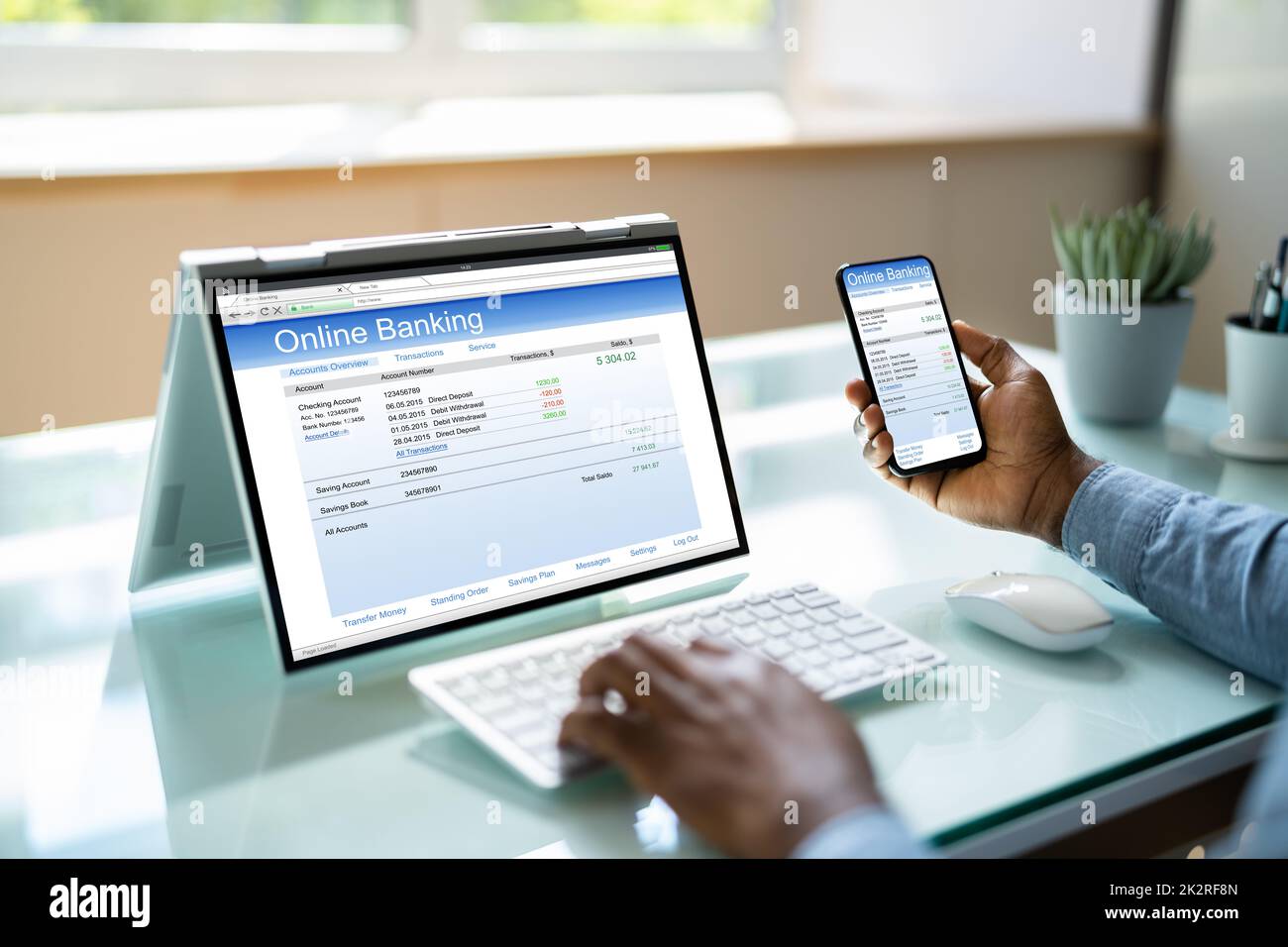 African American Doing Internet Bank Transfer Business Stock Photo - Alamy