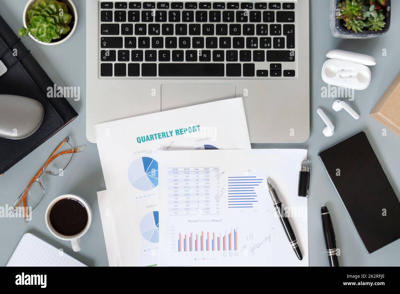 Modern office desktop with laptop, documents and gadgets top view Stock ...