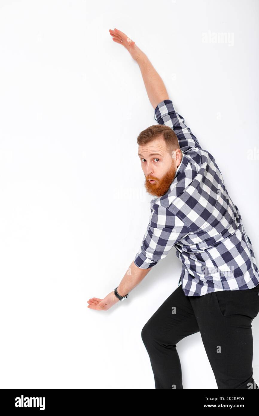 man with beard pointing copy space Stock Photo - Alamy