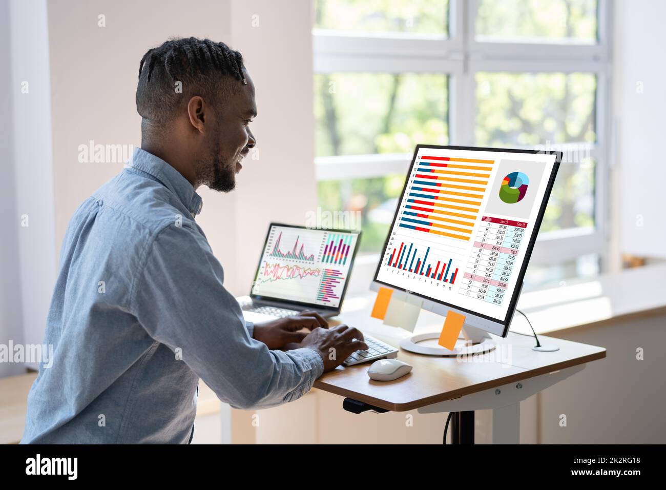 African Male Using Data Analytics Stock Photo - Alamy