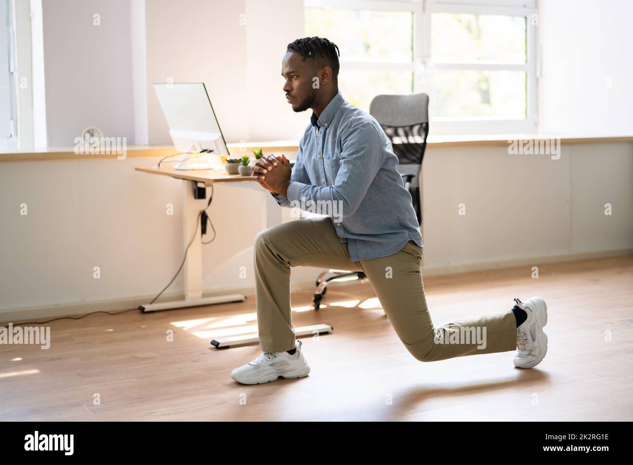 Standing Office Yoga Workout And Workout Stock Photo - Alamy