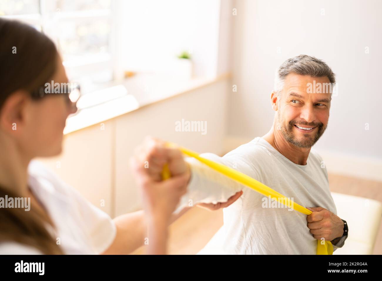 Band Resistance Physical Shoulder Exercise Stock Photo - Alamy