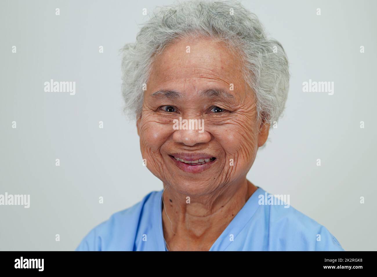 Asian elder senior woman patient sitting and smile face with happy on ...