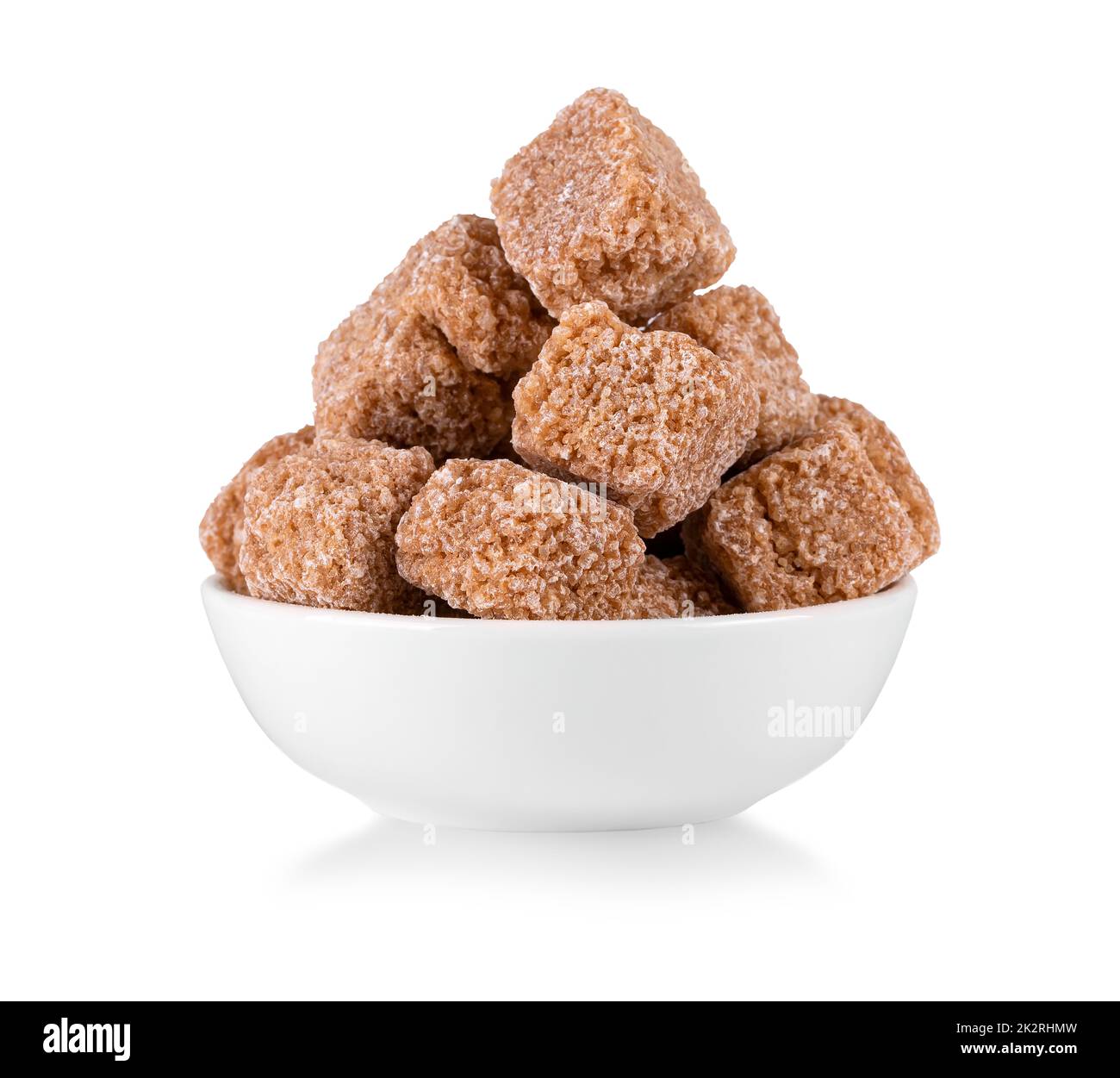 Raw of brown sugar cubes isolated on white background Stock Photo - Alamy