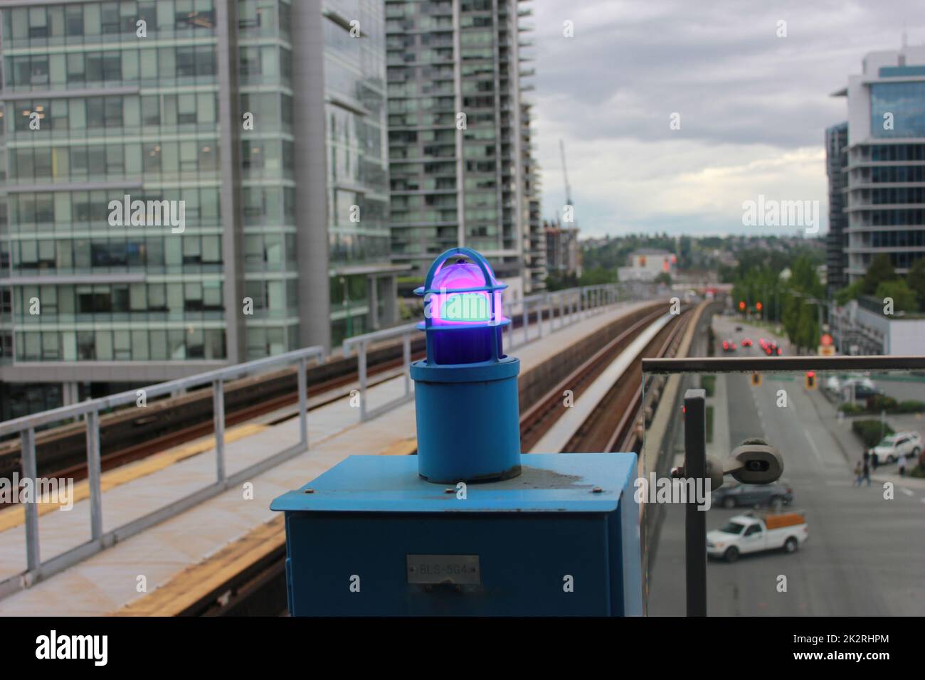 A blue light on the SkyTrain road in Vancouver, British Columbia ...