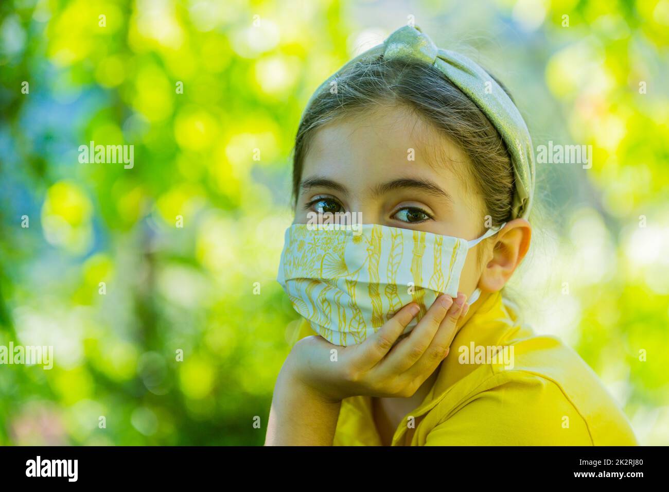 Little girl with mask Stock Photo - Alamy