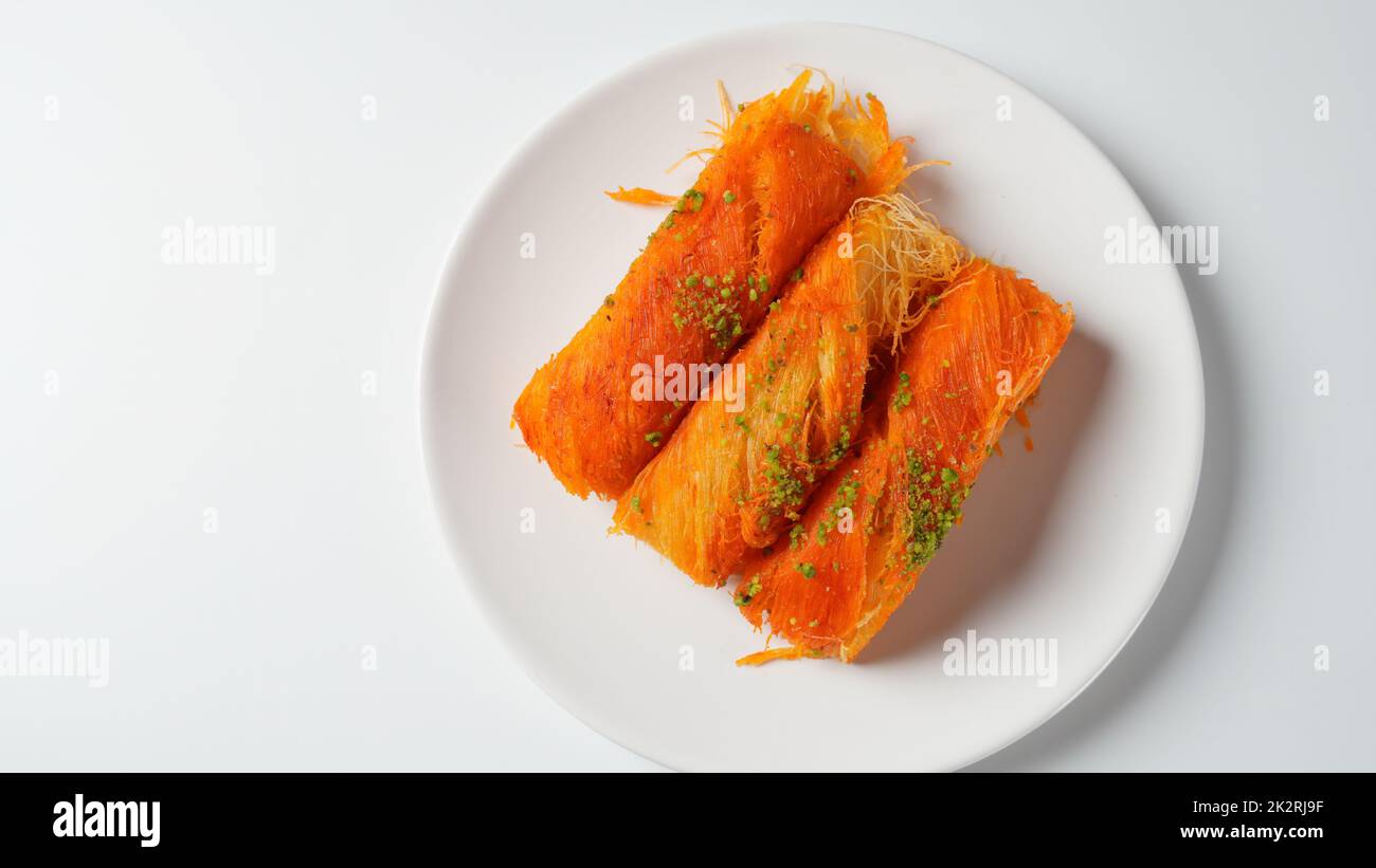 Knafeh - a Middle Eastern cheese pastry soaked in sweet, sugar-based ...