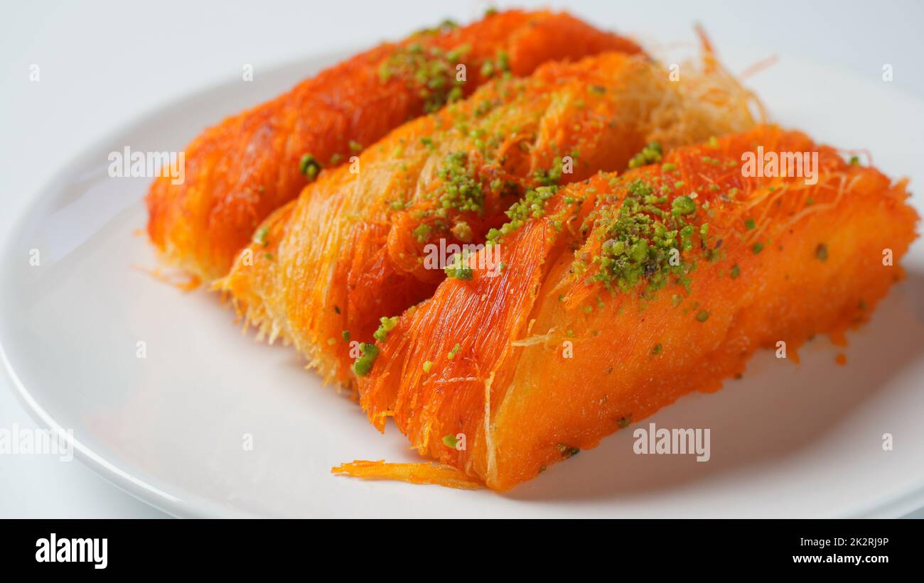 Knafeh - a Middle Eastern cheese pastry soaked in sweet, sugar-based ...