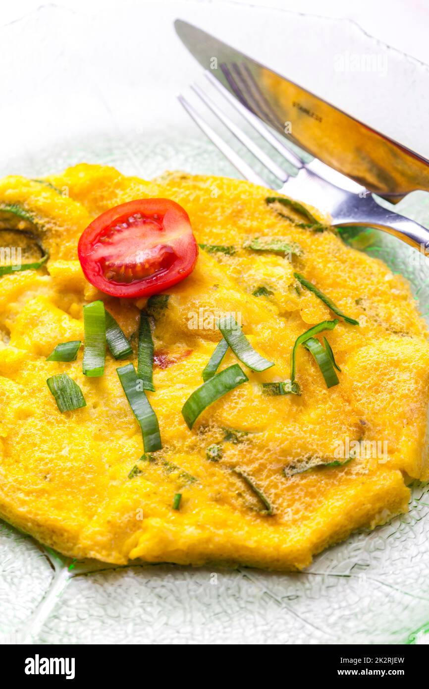 egg omelette with spring onion and tomato Stock Photo - Alamy
