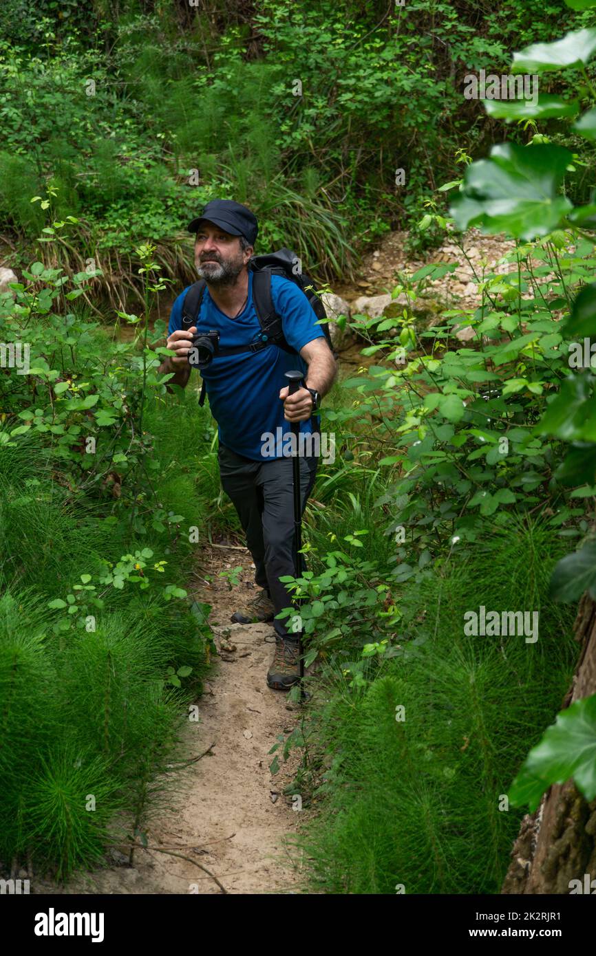 Man and green cap hi-res stock photography and images - Alamy