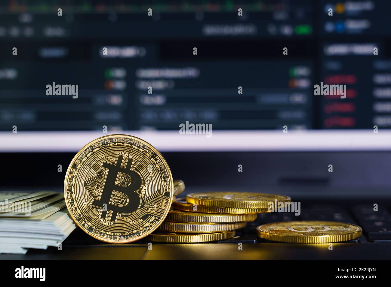 Bitcoins coins and banknotes on keyboard compute Stock Photo - Alamy