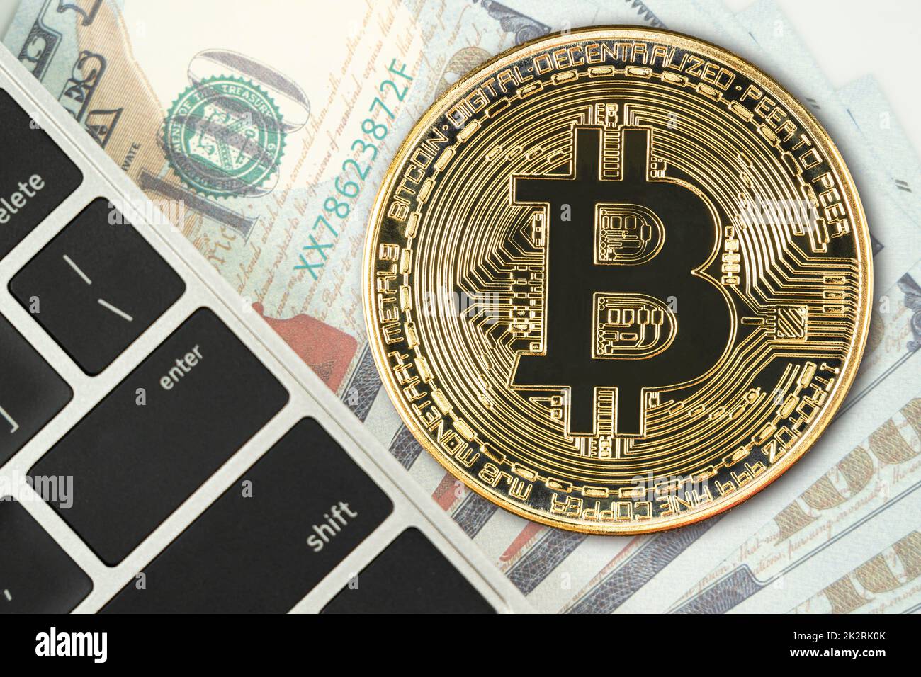 Golden Bitcoins coin and US banknotes with keyboard computer Stock ...