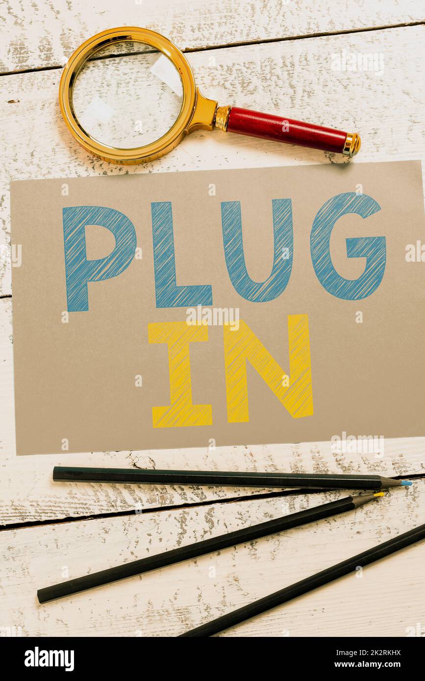 Inspiration showing sign Plug In. Internet Concept putting device into ...