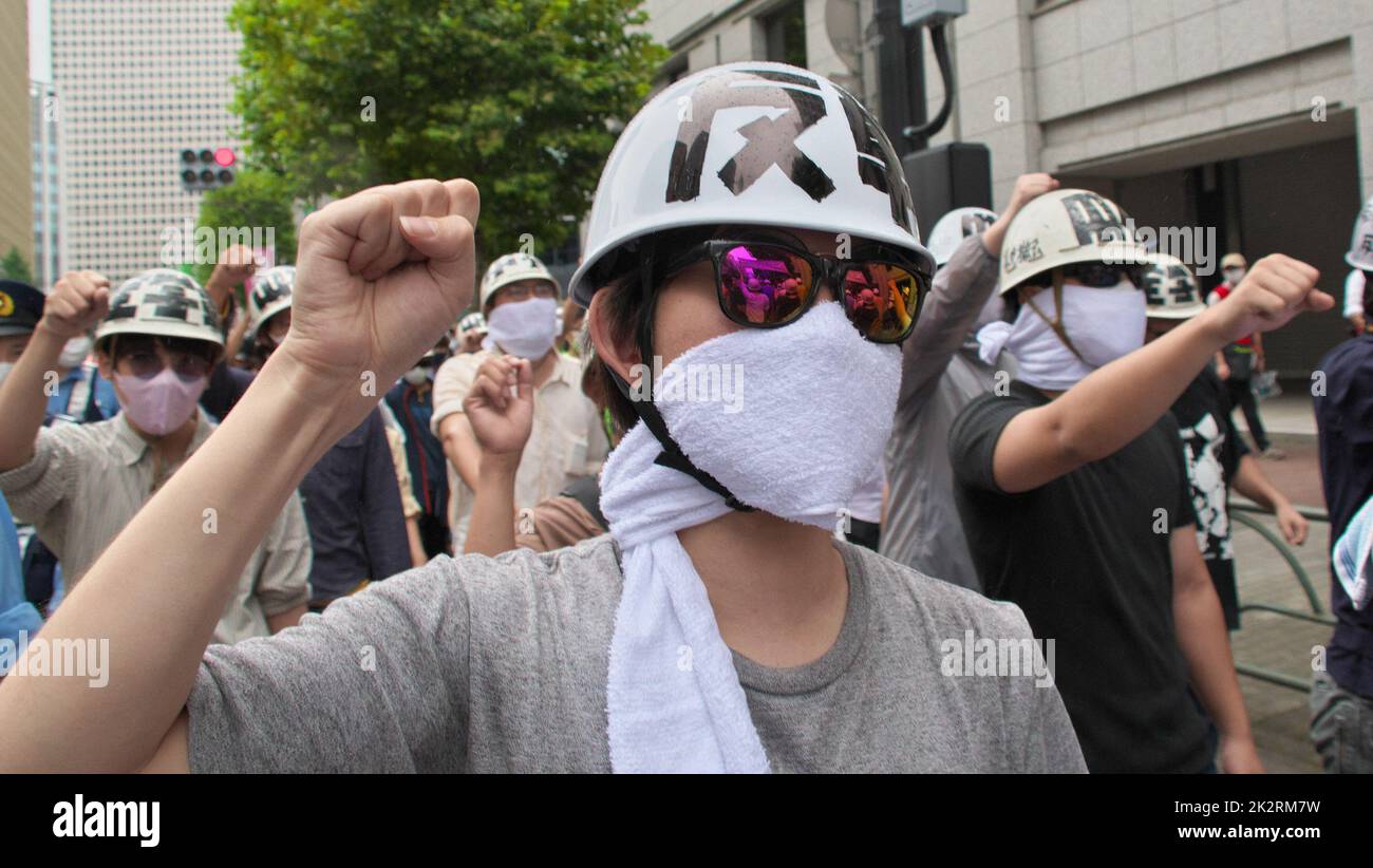 Tokyo, Japan. 23rd Sep, 2022. About 600 left wing activists march while ...