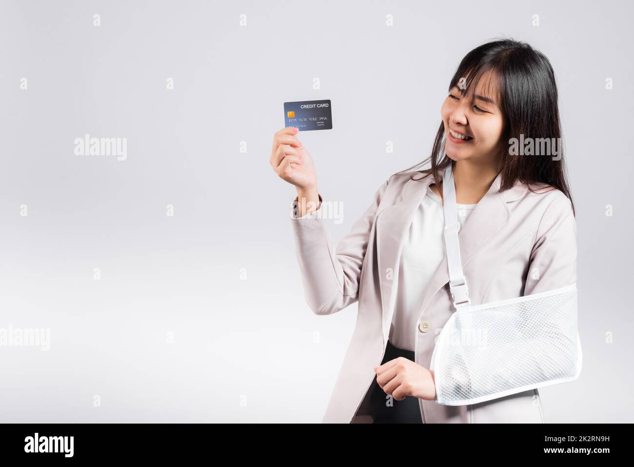 Woman confident smile broken arm after accident and wear arm splint for ...